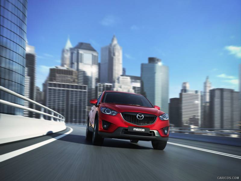 Comparison - Mazda CX-5 Grand Touring 2015 - vs - Infiniti QX30 Sport ...